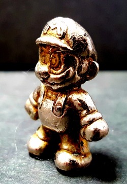 File:SM64 Metal Mario Figurine.jpg - Super Mario Wiki, the Mario ...