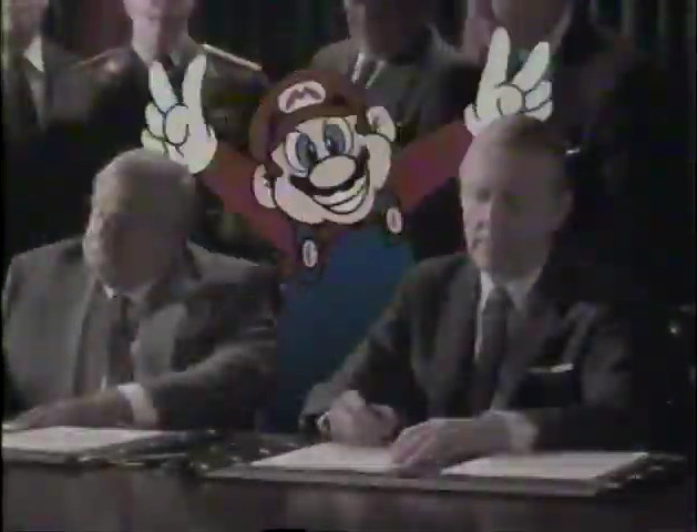 File:Mario Vsign AllStars Commercial.jpg - Super Mario Wiki, the Mario ...